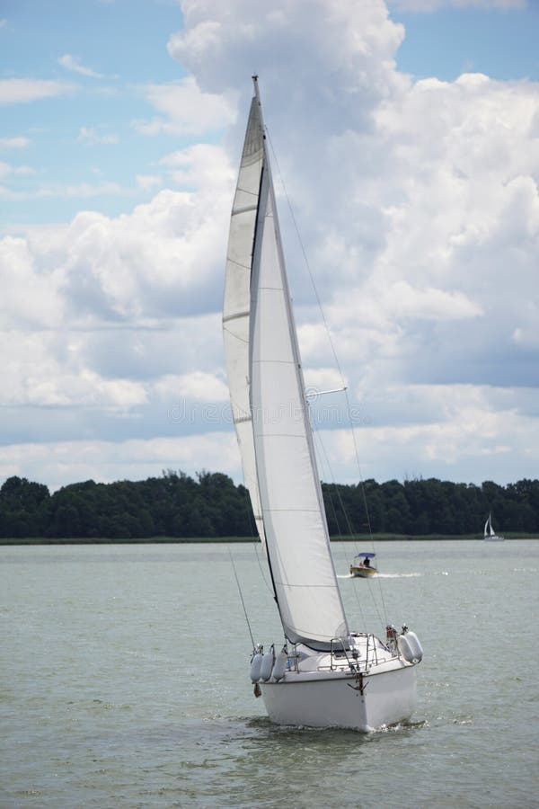 Sailboat Swimming on a Lake - Front View Stock Photo - Image of ...