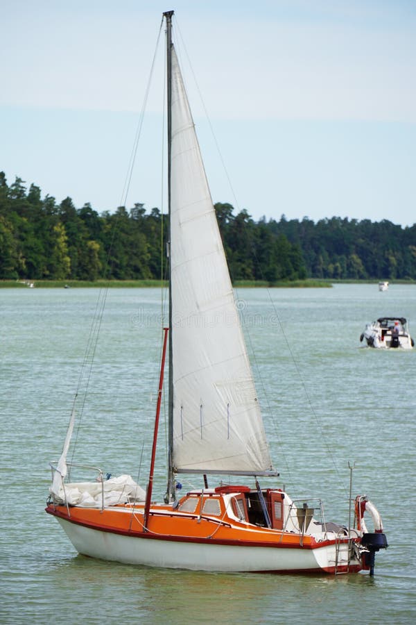 Sailboat Swimming on a Lake - Side View Stock Image - Image of boat ...