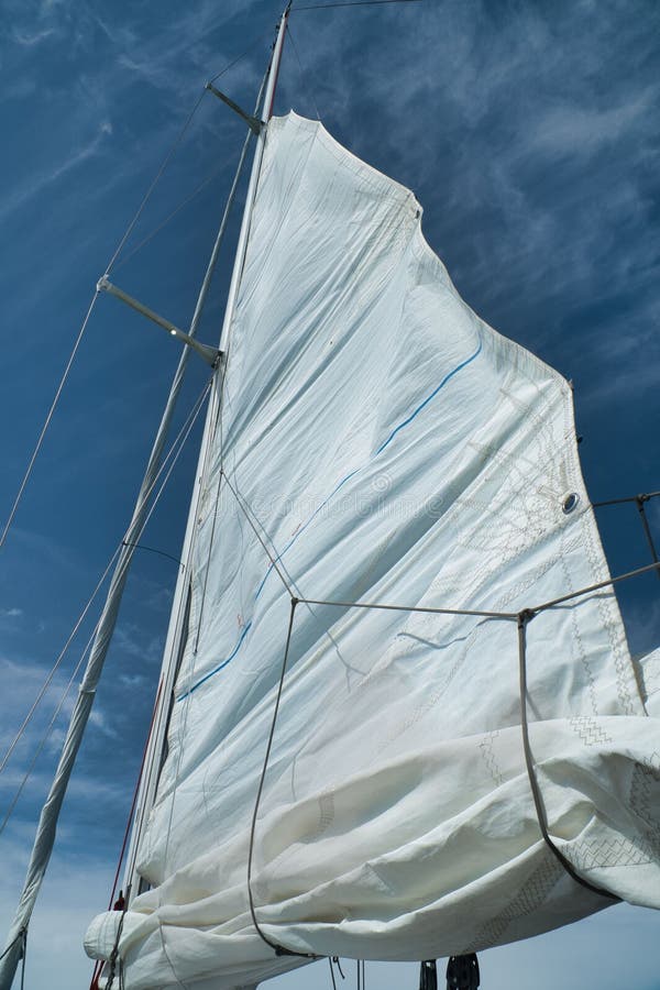 Sailboat with a White Cloth Draped Across the Front Sails. Stock Image ...