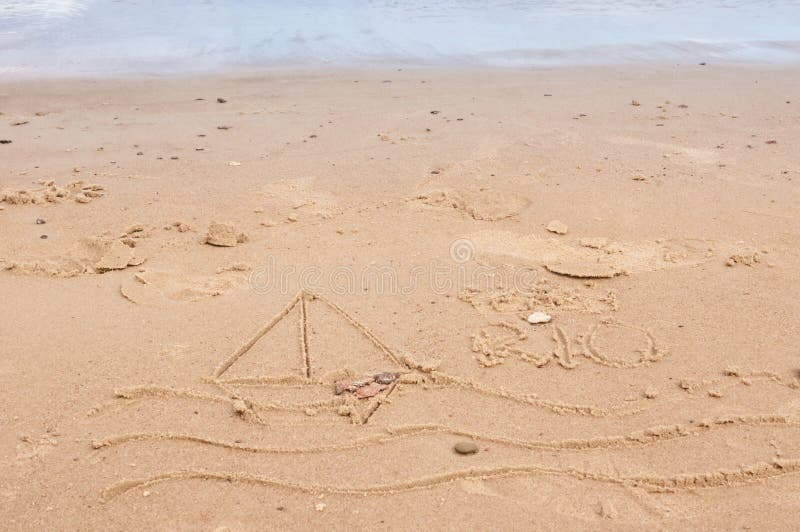 Sailboats Drawing in the Sand Stock Photo - Image of coast, sailing ...