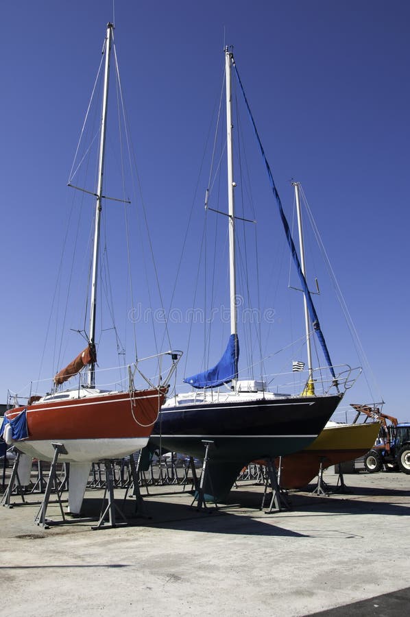 Sailboats in a dry dock stock image. Image of sailboats - 32321173