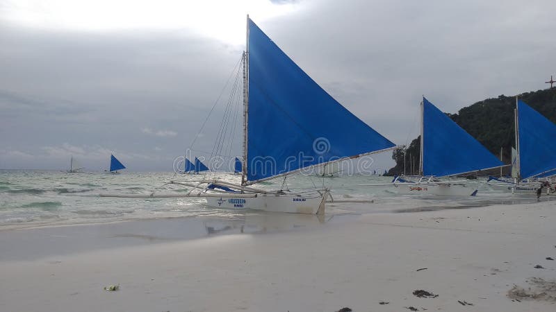 Sailing Boat on the Beach Floating Stock Photo - Image of lsland, ocean ...