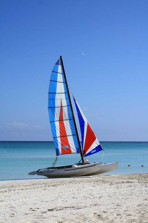Sailing Boat on the Beach stock photo. Image of serenity - 45144354