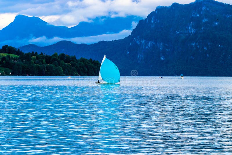 Sailing Boat on Body of Water Stock Image - Image of seashore, boat ...