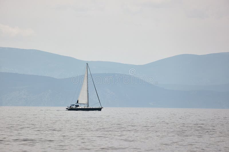 Sailing Boat in the Distance Stock Image - Image of sport, surface ...