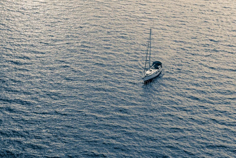 Sailing Boat Isolated on Deep Blue Sea Stock Photo - Image of sail ...