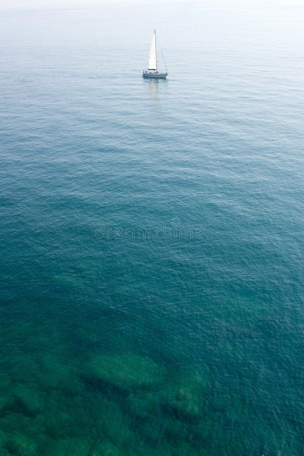 Sailing Boat in Limpid Water Stock Photo - Image of transparent ...