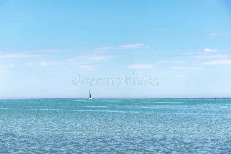 Sailing Boat in Open Water Seeing from a Distance on a Sunny Day Stock ...