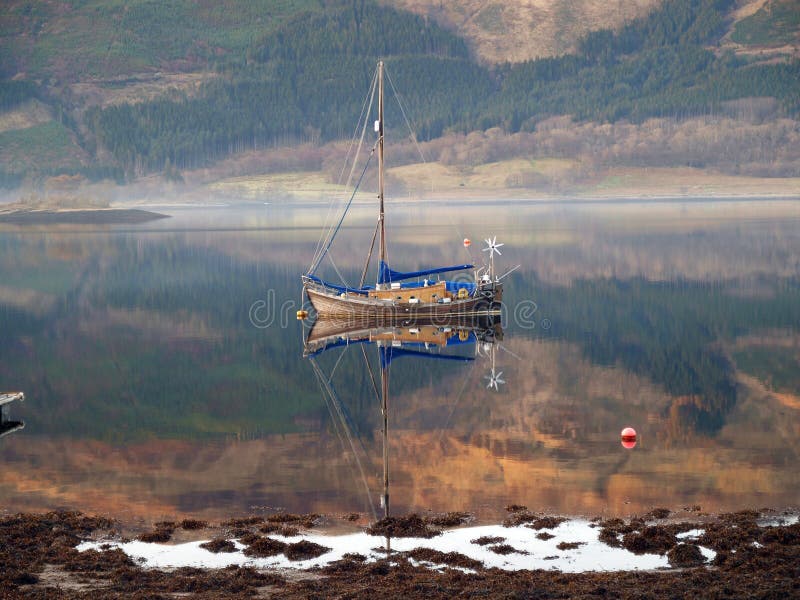 Sailing Boat Reflection on Loch Linnhe Stock Photo - Image of soothing ...