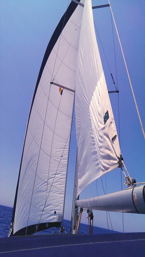 Jib Sail and Rigging on Sailboat Stock Image - Image of billowing, boat ...