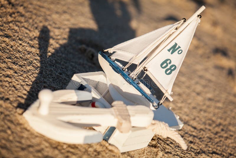 Sailing Boat and Seashell Sand Decoration Closeup Stock Image - Image ...