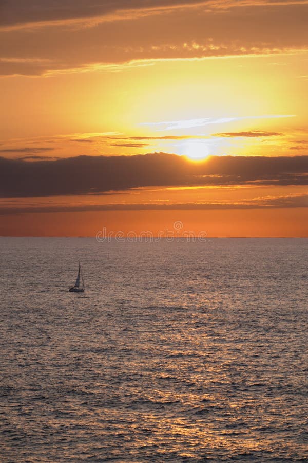 Sailing boat at sunset stock image. Image of ocean, boat - 191067365