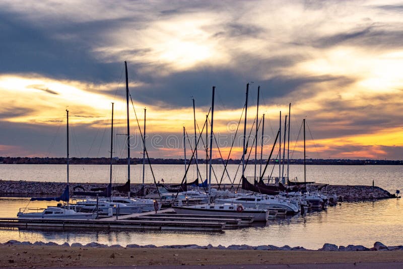 Sailing Boats by the Port Captured Under the Beautiful Sunset Stock ...