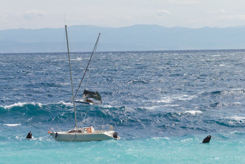 Sailing boats on waves stock image. Image of splashing - 25937183