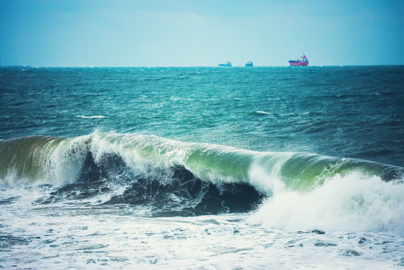 Sailing Cargo Ship and Crashing Sea Waves Stock Photo - Image of nature ...