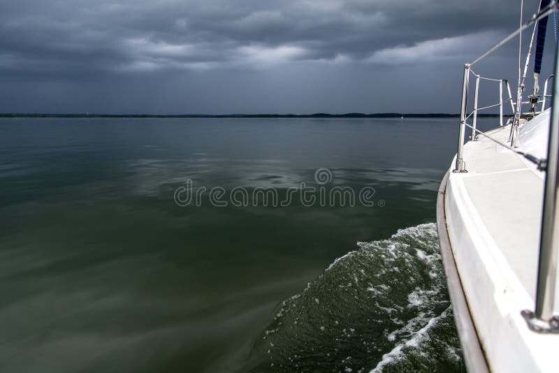 Sailing Concept with Boat and Lake Water Storm Weather Stock Image ...