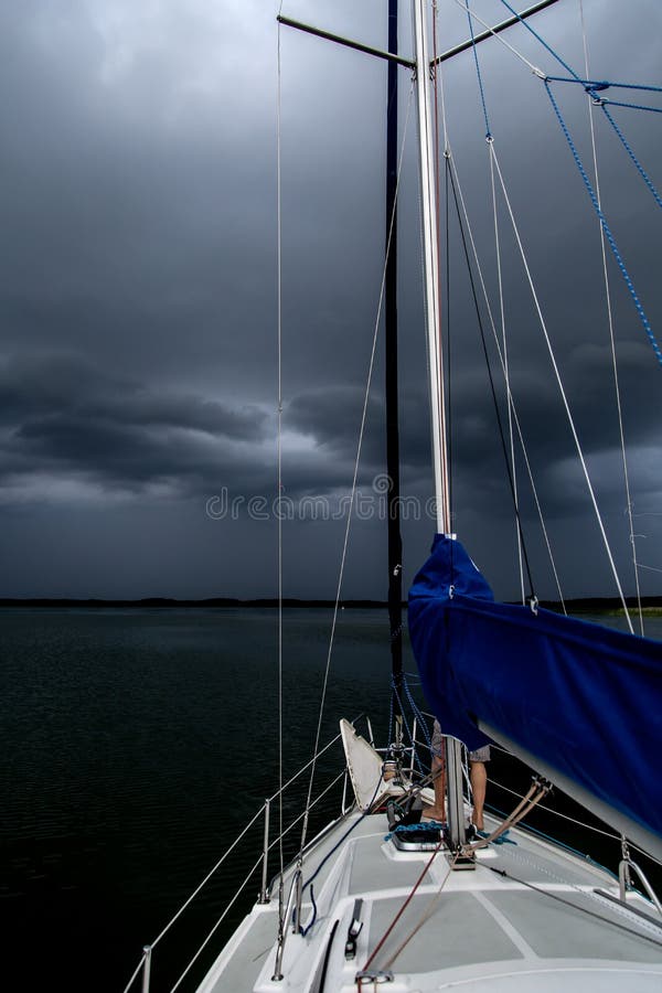 Sailing Concept with Boat and Lake Water Storm Weather Stock Image ...
