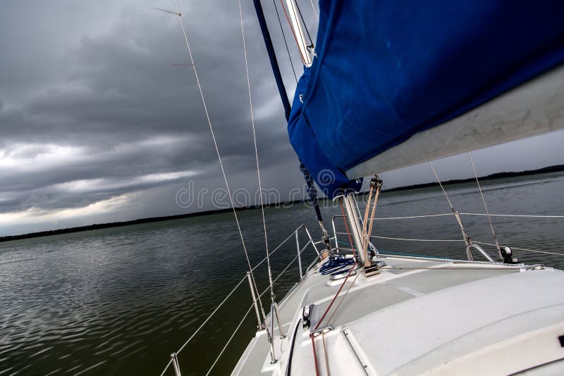 Sailing Concept with Boat and Lake Water Storm Weather Stock Photo ...