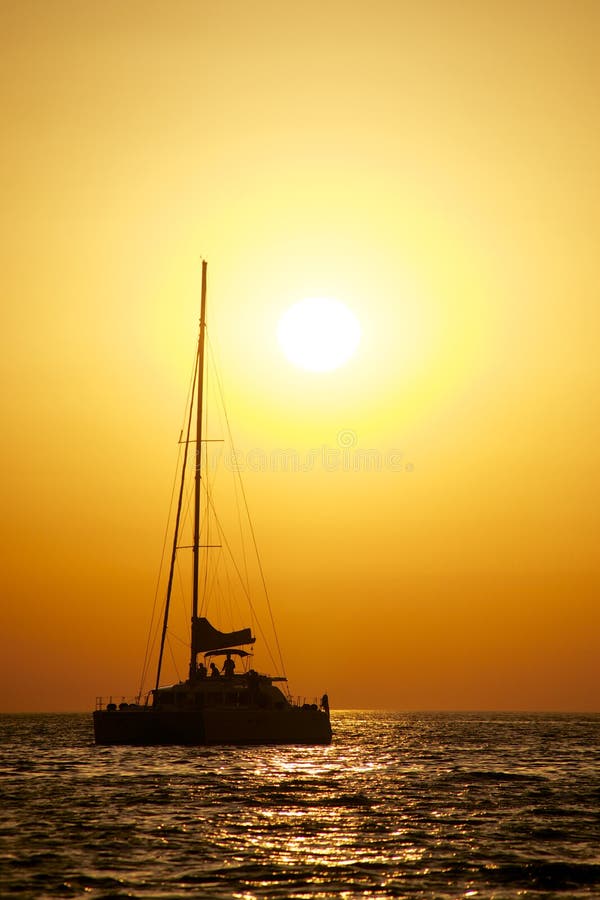 Sailing in the evening stock photo. Image of sunset, background - 25862524