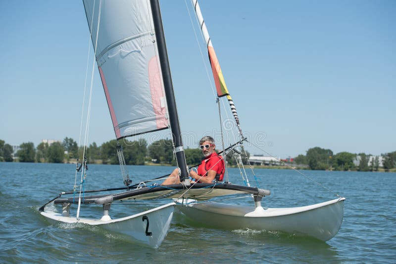 Sailing man on boat stock image. Image of sport, sailor - 161828661