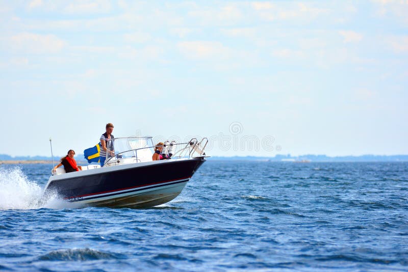 Power Boat with People Fishing on the Pond in the Countryside in Summer ...