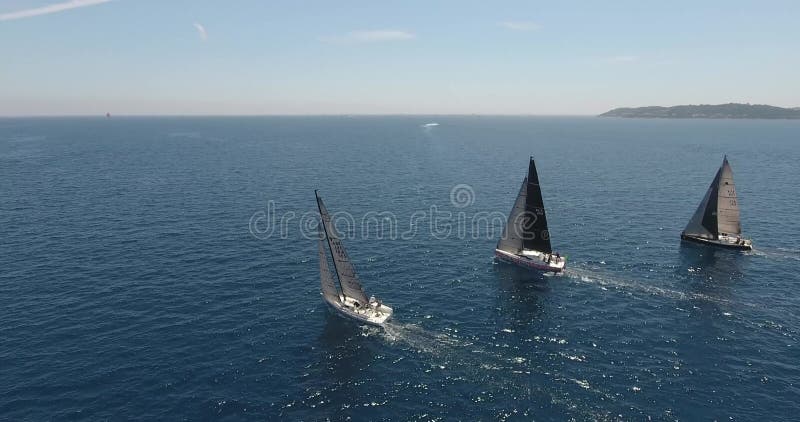 Sailing Regatta in Open Waters with Multiple Yachts Competing Under ...
