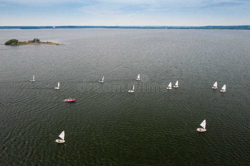 Sailing Regatta on the Sea. Many White Sails Float on the Water Stock ...
