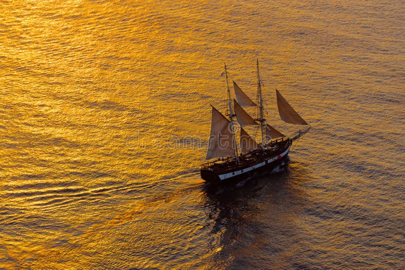 Sailing ship at sunset stock image. Image of sailing - 27234419