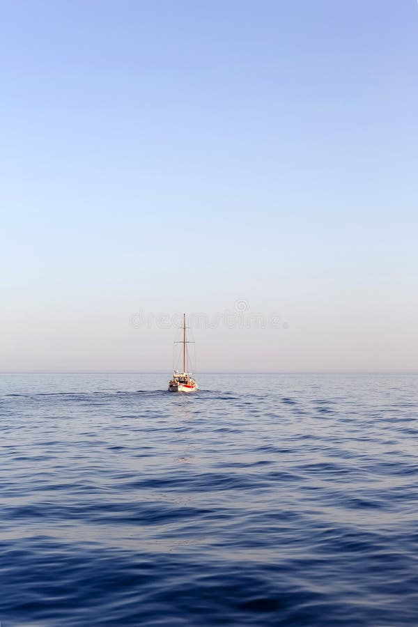 A Sailing Ship on the Horizon on the Aegean Sea Stock Photo - Image of ...