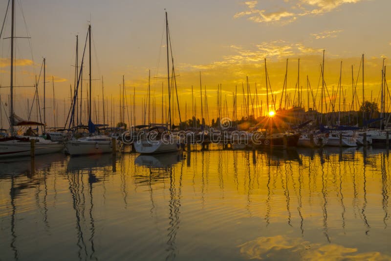 Sailing Ships in the Harbour of Balatonkenese at Sunset Stock Photo ...
