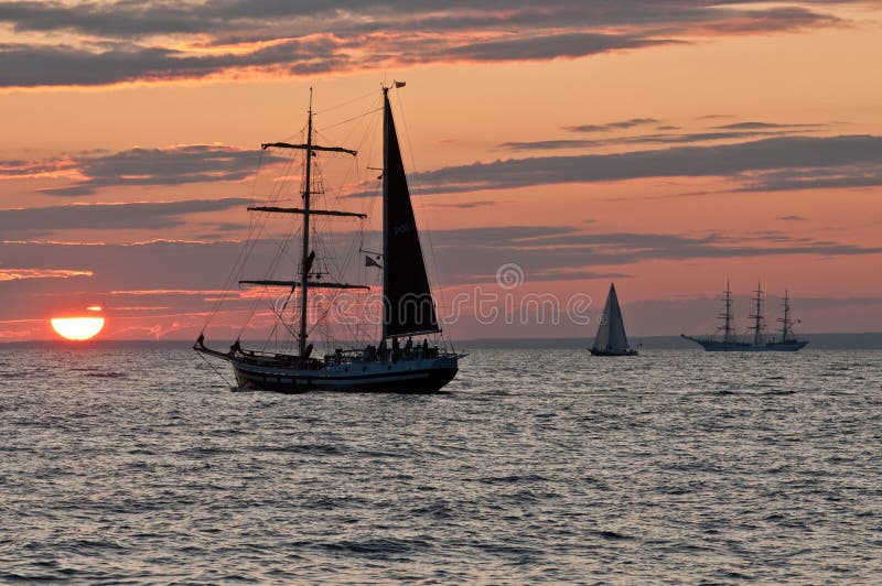 Sailing ships in Sunset stock image. Image of voyage - 46540319