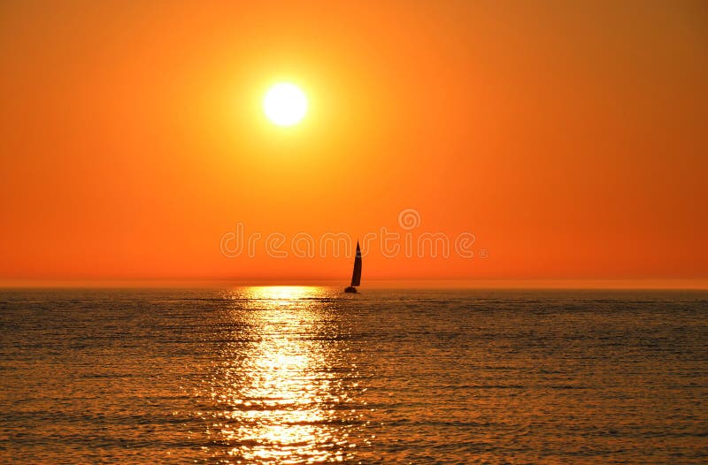 Sailboat on Sunset Lake stock image. Image of sailboat - 21444037