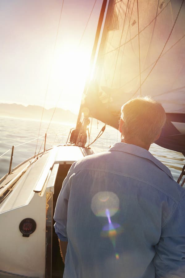 Sailing to the sunrise stock image. Image of cruise, cord - 855569