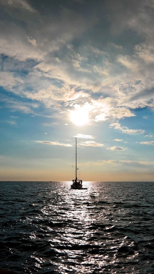 Sailing at sunset stock image. Image of skyline, light - 108128909