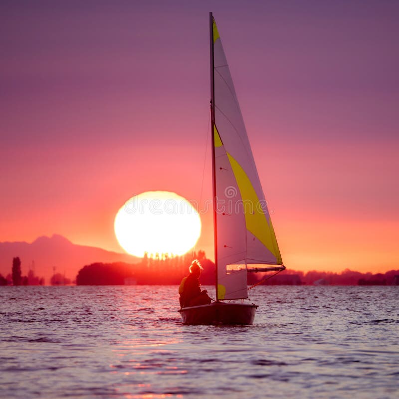 Sailing into the sunset stock photo. Image of dusk, burning - 14806832