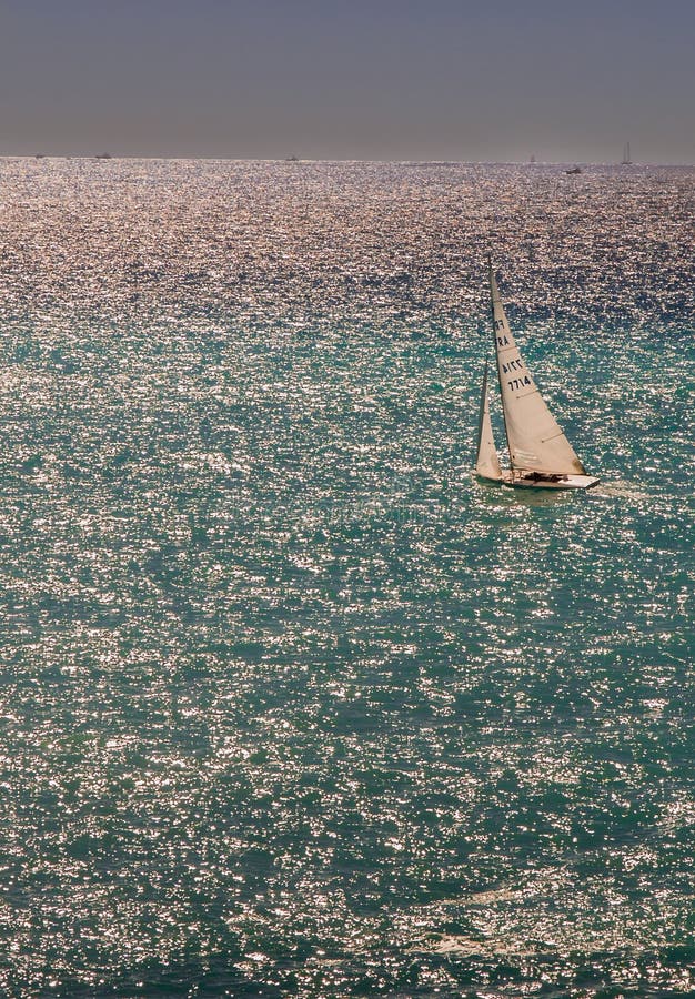 Nice Sailboat Sailing At Sunset Stock Image - Image of freedom, rays ...