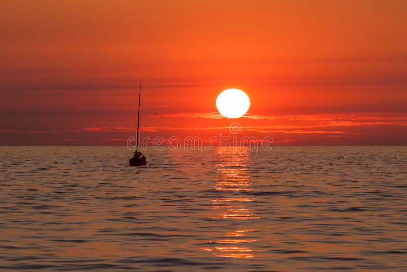 Sailing at sunset stock photo. Image of sail, coast, atmosphere - 49644230