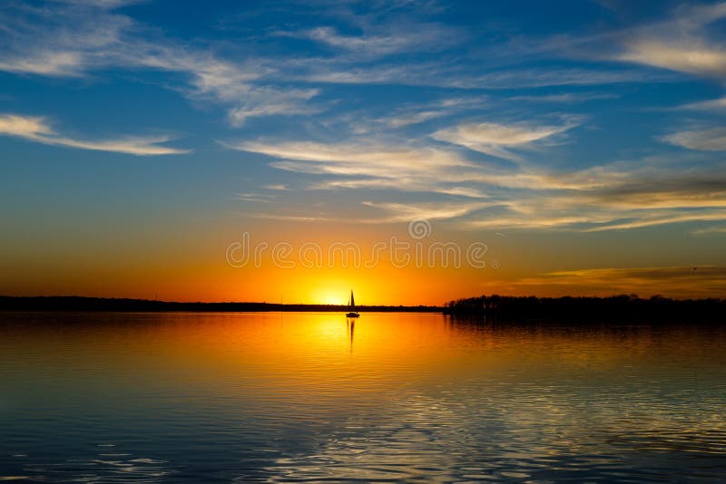 Sailing at Sunset stock image. Image of scene, blue - 235984099
