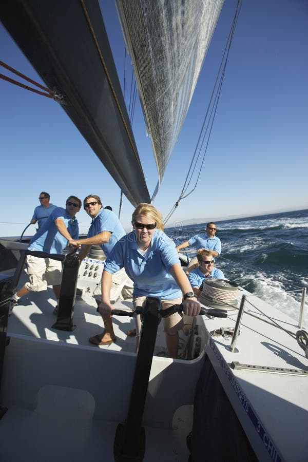 Photo of Sailing Team on Yacht Stock Photo - Image of sail, cruise ...