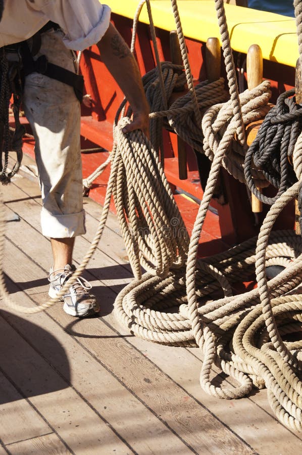 Sailor Coils a Line after Setting Sail Stock Photo - Image of boat ...