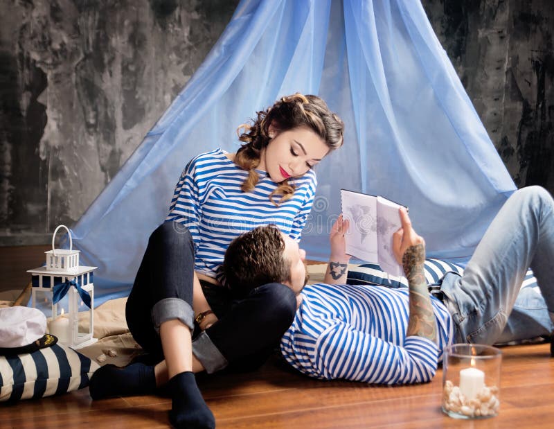 Sailor Couple Love Story, Reading Map Together. in Studio Stock Image ...