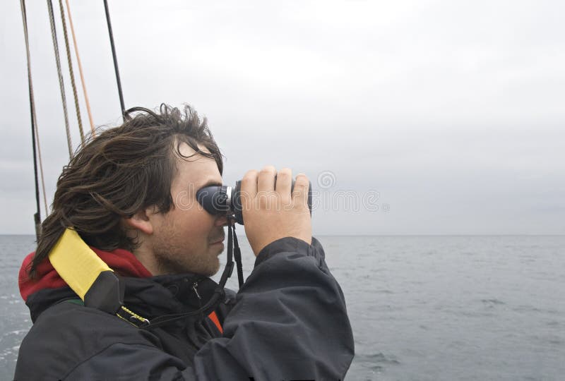 Sailor with Binoculars stock image. Image of horizon, face - 7216249