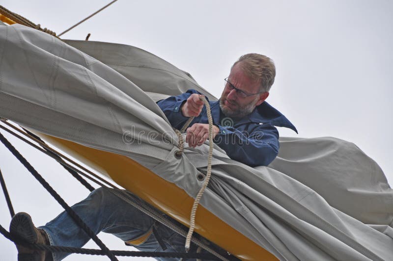 Sailor setting sail stock photo. Image of sailing, beaufort - 53862748