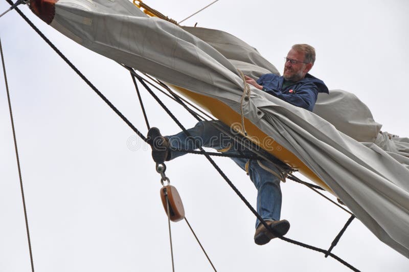 Sailor setting sail stock photo. Image of sailing, beaufort - 53862748