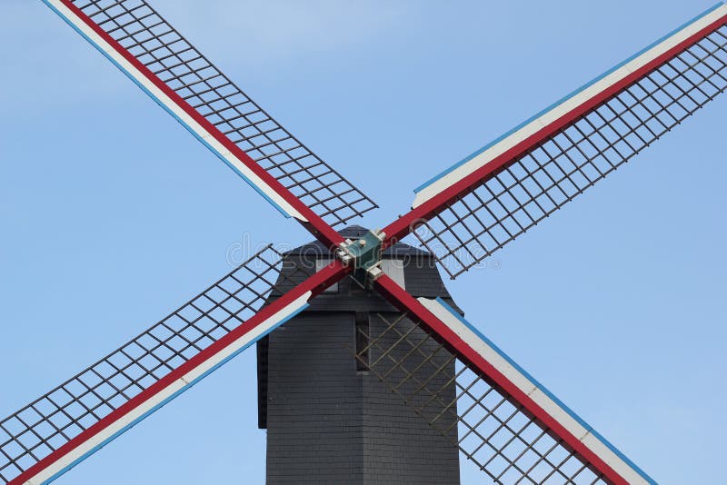 The Sails of a Windmill Against a Clear Blue Sky Stock Photo - Image of ...