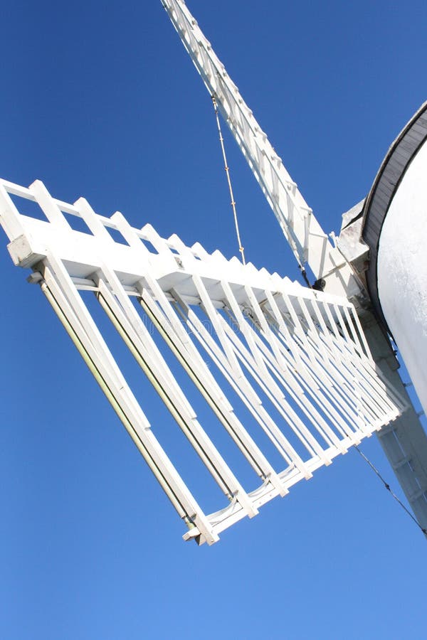 The Sails of a Windmill Against a Clear Blue Sky Stock Photo - Image of ...