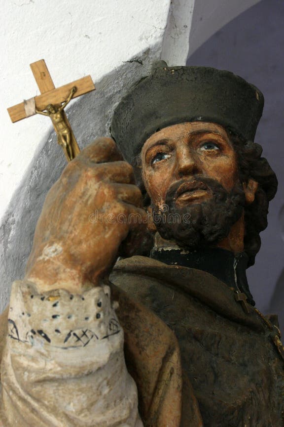 Saint with cross stock photo. Image of christianity, crucification - 983140