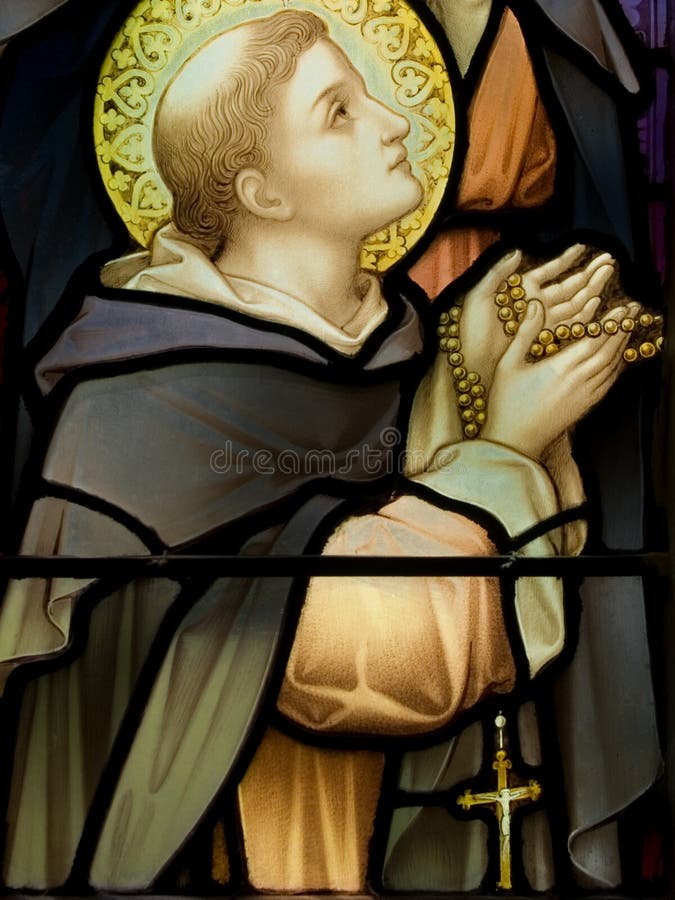 Saint with a rosary stock photo. Image of rosary, window - 2765718
