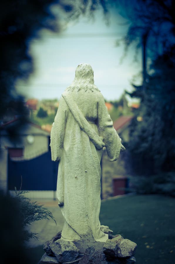 Saint statue back view stock image. Image of monument - 108327485