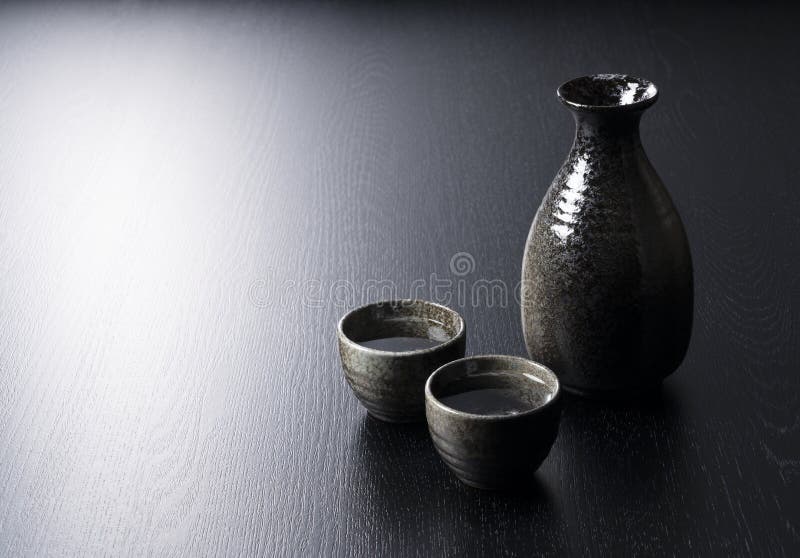 Sake Containers on a Black Background Stock Photo - Image of alcohol ...